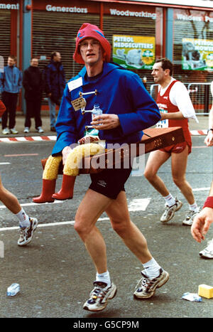 Runner in Paddington Bear costume fancy dress running in the Vitality ...