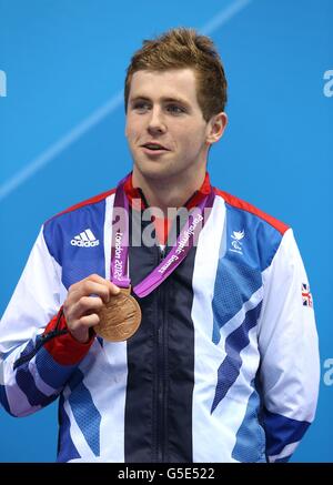 Great Britain's James Clegg on the podium with his the bronze medal for ...