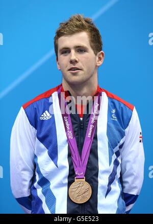 Great Britain's James Clegg on the podium with his the bronze medal for ...