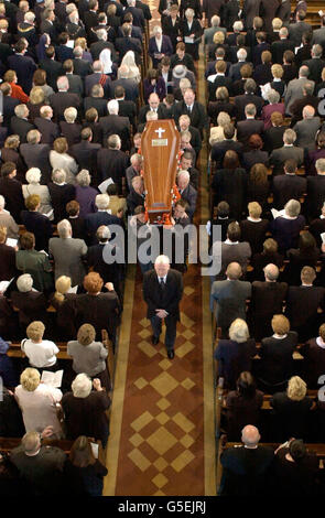 The coffin is carried out of the Catholic Cathedral in Glasgow, at the ...