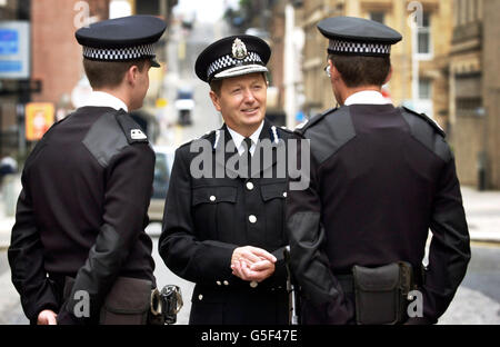 Strathclyde Police's new Chief Constable Willie Rae sits at his desk on ...
