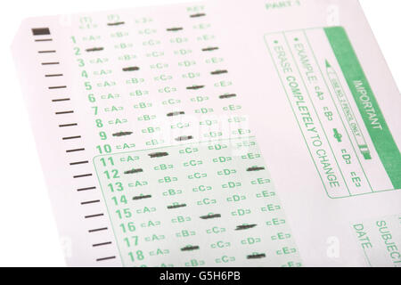 Optical scan answer sheet for a school exam with student erasing answer ...