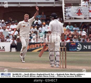 South African cricket captain Peter van der Merwe walking from a plane ...