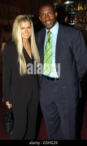 Former Olympic Gold Medalist Linford Christie accompanied by his ...