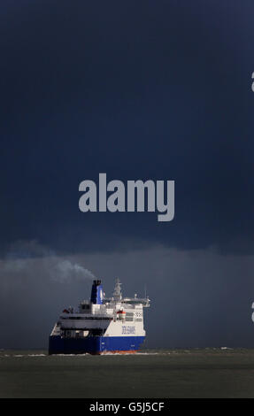 Storm clouds gather over the English countryside Stock Photo - Alamy