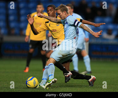 Coventry City's Carl Baker has a shot on goal against Oldham Athletic Stock Photo - Alamy