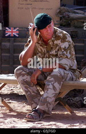 Royal Marine Sgt Paul Smitham from Penzance, Cornwall listens to BBC ...