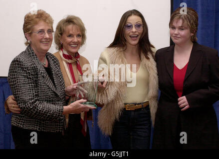 From left to right actress Betty Woolf , actor Charles Stapley ...