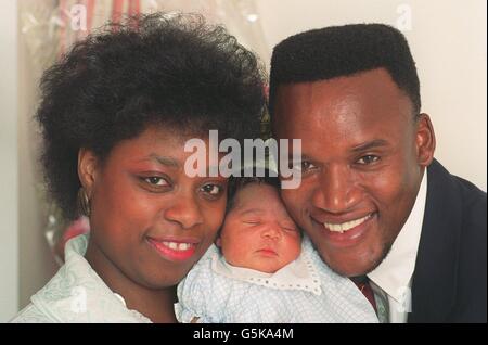 Devon Malcolm wife Jenny and baby Erica Stock Photo - Alamy