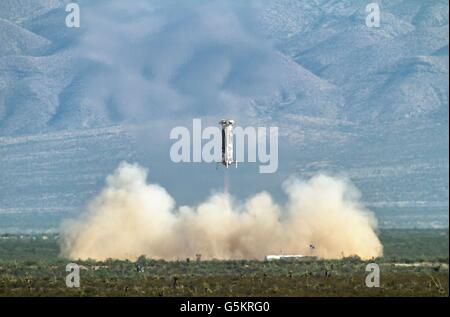 The Blue Origin New Shepard reusable rocket descends to land at the ...