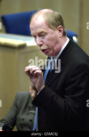 Scottish Health Minister Malcolm Chisholm talks with demonstrators ...