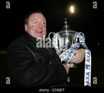 Canvey Island's manager Jeff King is hugged by Neil Gregory following ...