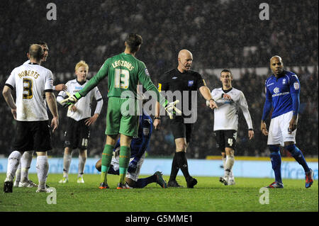 Derby County players react to referee Nigel Miller awarding Birmingham ...