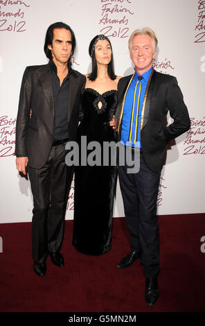 Susie Cave, left and Nick Cave arrive at the Oscars on Sunday, March 15 ...