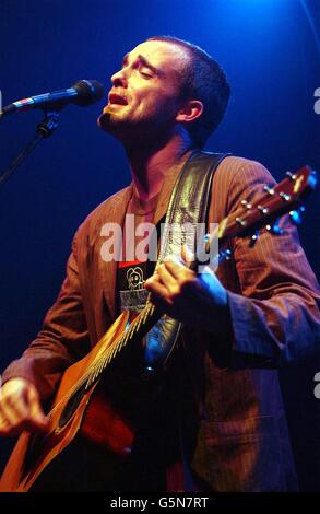 Singer Fran Healy, of Scottish pop group Travis, performing on stage at ...