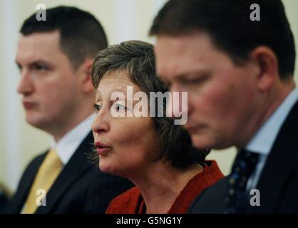 Geraldine Finucane (centre) and her two sons Michael (right), and John ...