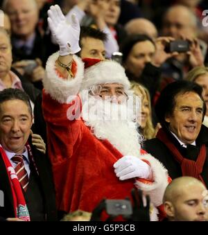 A Liverpool fan dressed as Santa Claus in stands during the Premier ...