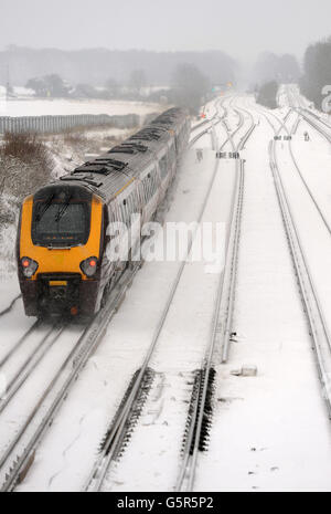A Cross Country train makes it;s way along the tracks after leaving ...