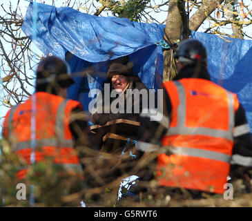 A road protestor negotiates with bailiffs as she becomes the final ...