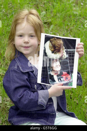 A photograph of a mother with her child, captured in Ialomița, Romania ...