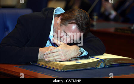 Liam Neeson signs the freedom of Ballymena acceptance at Braid Centre ...