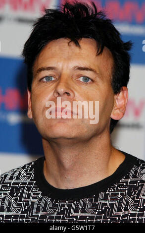 Pop star Gary Numan poses for the media during a record signing for his ...