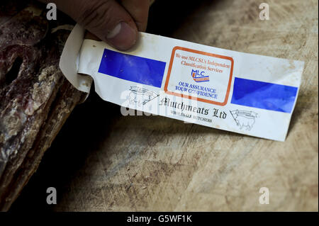 A meat identifying tag on a beef carcass, complete with barcode, that ...