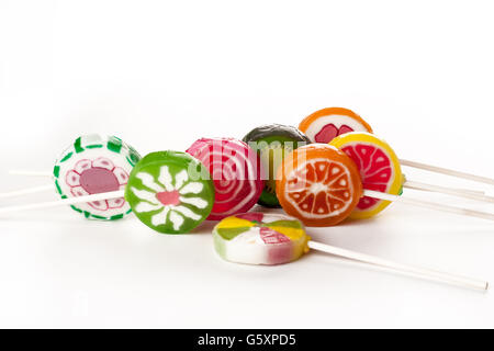 Set of colorful lollipops on colored background. Summer concept. Party ...