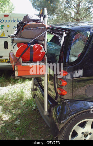 tiny car with a large loading Stock Photo - Alamy