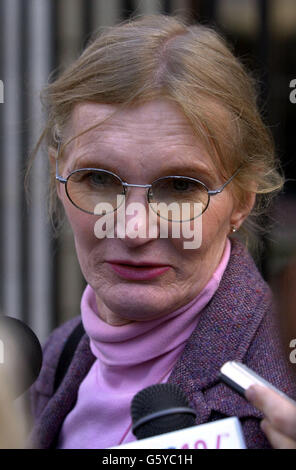 Transsexual dentist, Dr Lydia Foy, (left) leaving the High Court with a ...