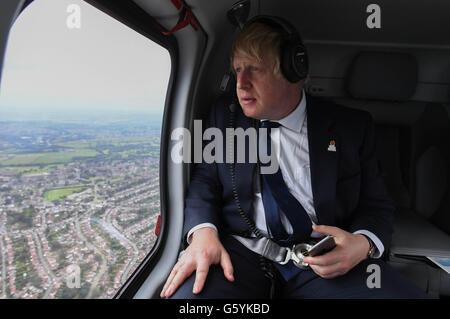Boris Johnson sits in a helicopter taking off from Selby, North ...