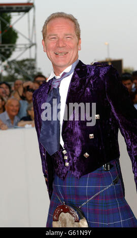 British Director Peter Mullan arrives with his wife Ann Swan at the ...