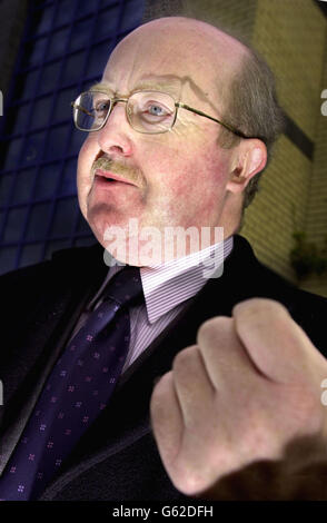 Scottish Environment Minister Ross Finnie prepares to make a statement ...