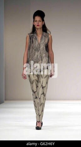 A model wearing a creation by Joe Casely-Hayford on the catwalk at the ...