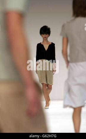 A model wearing a creation by Joe Casely-Hayford on the catwalk at the ...