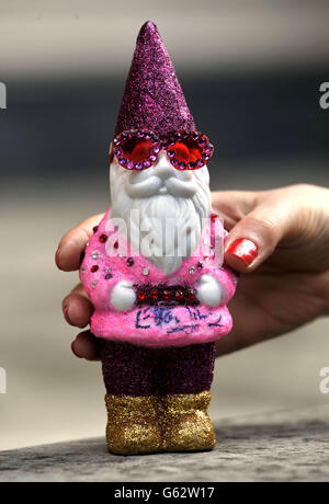 A celebrity painted gnome by singer Sir Elton John, prior to being ...