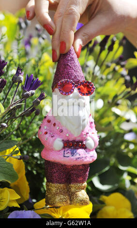 A celebrity painted gnome by singer Sir Elton John, prior to being ...