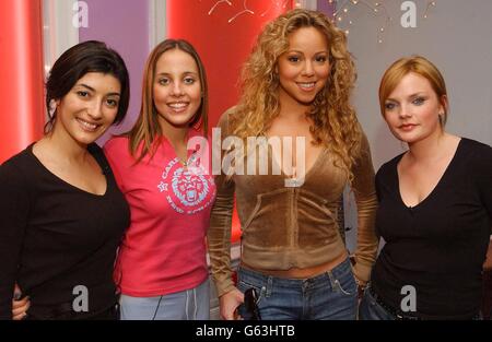 American singer Mariah Carey (centre) visits the Fame Academy house in ...
