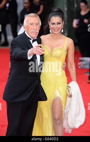Bruce Forsyth and wife Winnie arriving for the 2013 Arqiva British ...