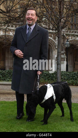 Home Secretary David Blunkett introduces his new guide dog Sadie to the ...