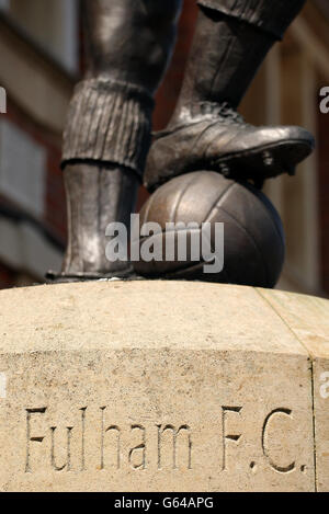 The statue of former player Johnny Haynes stands outside Craven Cottage ...