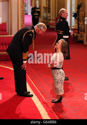Paralympic swimmer Ellie Simmonds receives her Officer of the British ...