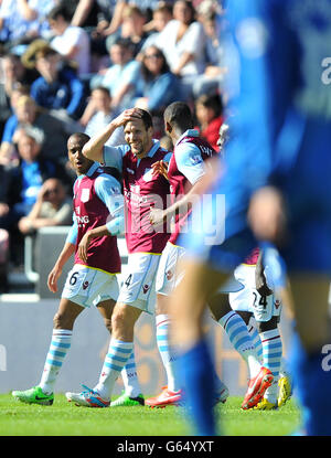 Aston Villa's Ron Vlaar celebrates scoring his side's first goal of the ...