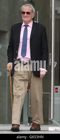 Former Garda sergeant Owen Corrigan leaves the Smithwick Tribunal ...