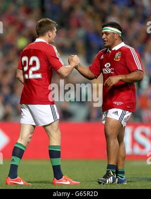 Owen Farrell, left, of the British & Irish Lions and Jock Campbell of the AUNZ Invitational XV ...
