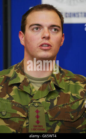 Capt Mark Moutarde of the 1st Battalion Queen's Lancashire Regiment and ...