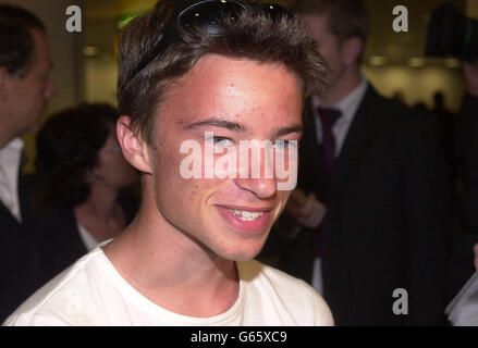 Seb Clover, who sailed the Atlantic alone, poses with his Inspiration ...