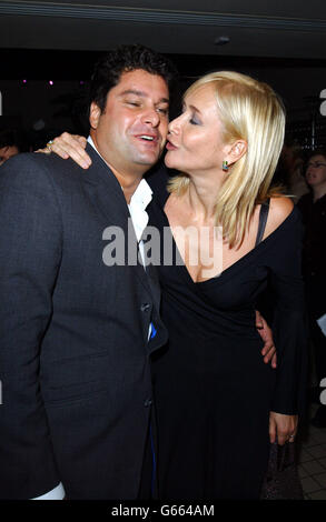 TV presenter Tania Bryer and husband Tim Mouffaridge arrive for the UK ...