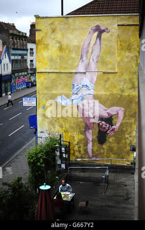 Artist Cosmo Sarson with his new mural called Breakdancing Jesus ...