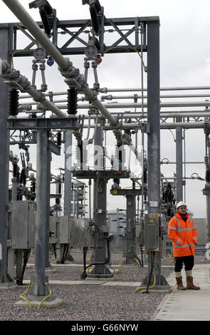 Overhead feeder power line on pole with fuse cutout switch for ...